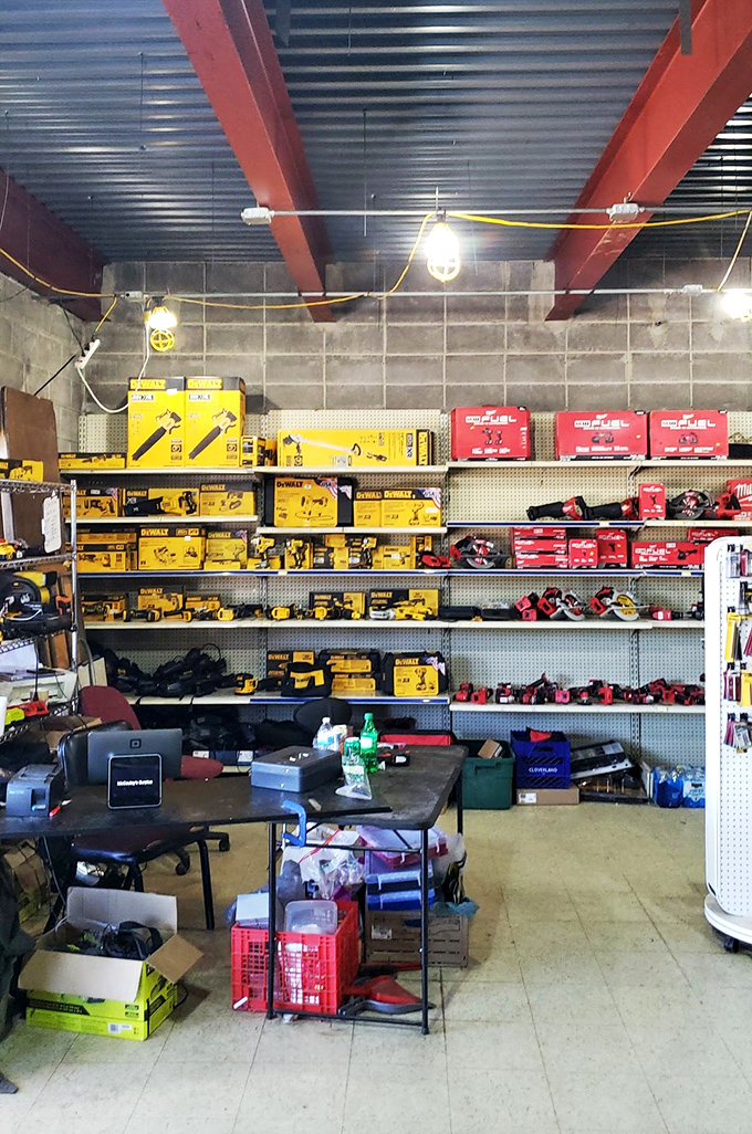 Tool heaven! This DeWalt and Milwaukee display would make Tim Allen grunt with approval&mdash;a handyman's dream tucked inside a flea market. 