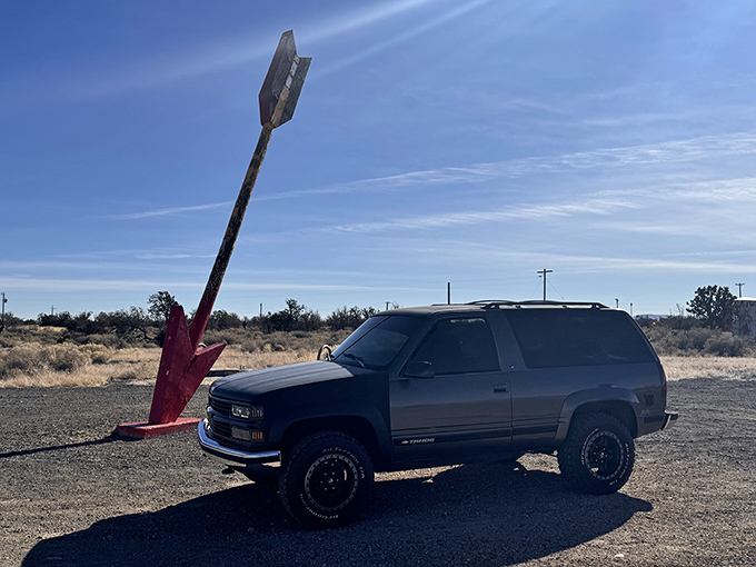 These twin sentinels have weathered decades of desert storms while maintaining their quirky roadside dignity perfectly.
