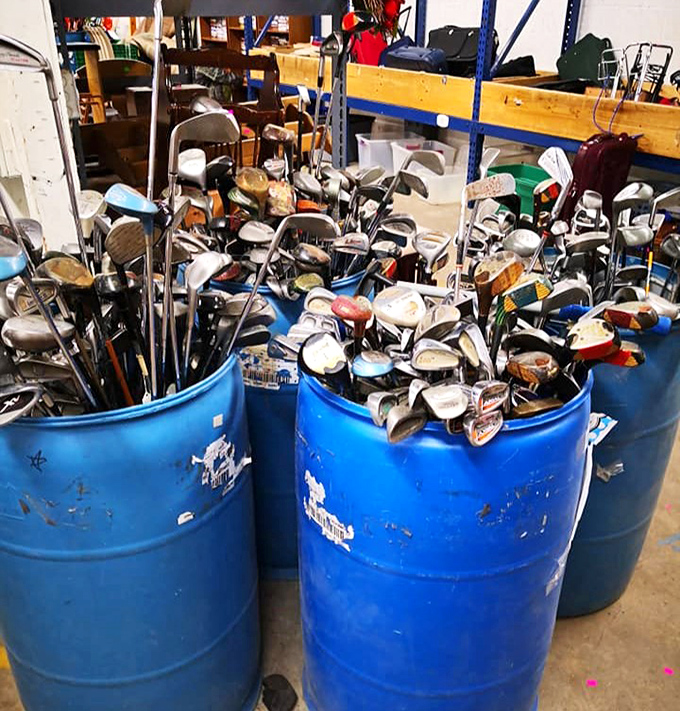 Golf club jackpot! These blue barrels hold more stories than a country club locker room&mdash;each dent and scuff a chapter in someone's sporting life.
