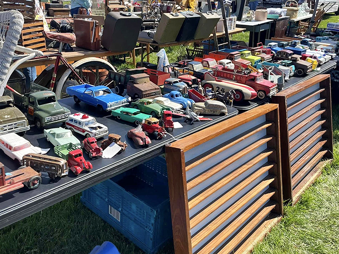Miniature automotive history lines up for inspection. Each tiny vehicle represents some collector's first car, family road trip, or childhood dream ride.