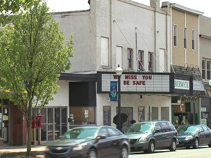 Berwick&rsquo;s vintage theater marquee offers a heartfelt message to the community, a quiet reminder of resilience on a small-town main street.