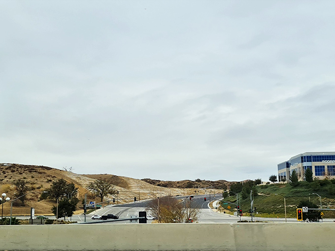 California City's desert landscape stretches toward the horizon. That building in the distance? Probably costs less than a San Francisco garage!