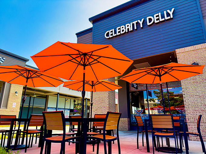 Celebrity Delly's bright orange umbrellas promise sunshine even on cloudy days. The kind of patio that makes you linger long after the last bite.