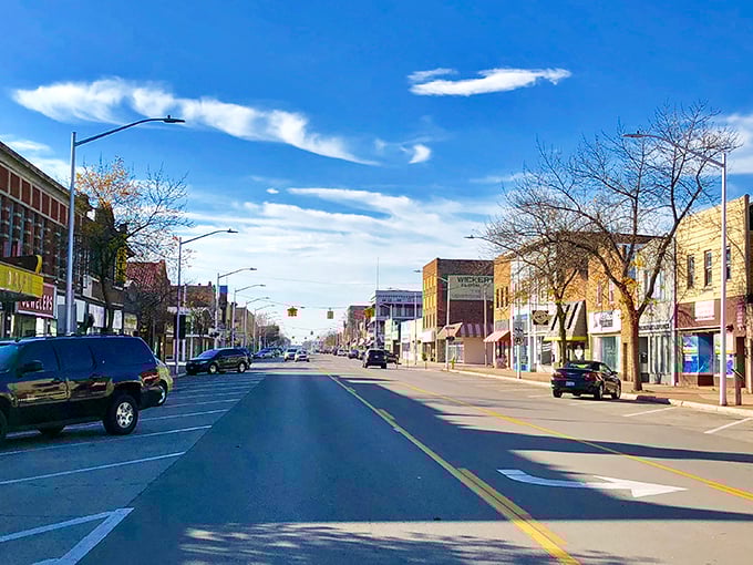 Downtown streets showcase charming storefronts, friendly locals, and small-town energy beneath a clear blue sky in beautiful Escanaba.