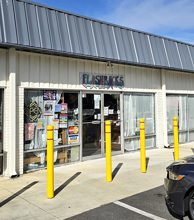 Flashbacks' storefront promises vintage vibes—where mannequins model decades of fashion history for pocket change.