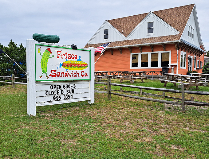 A pickle in a hat? Only at the beach, where sandwich whimsy meets serious hunger satisfaction.