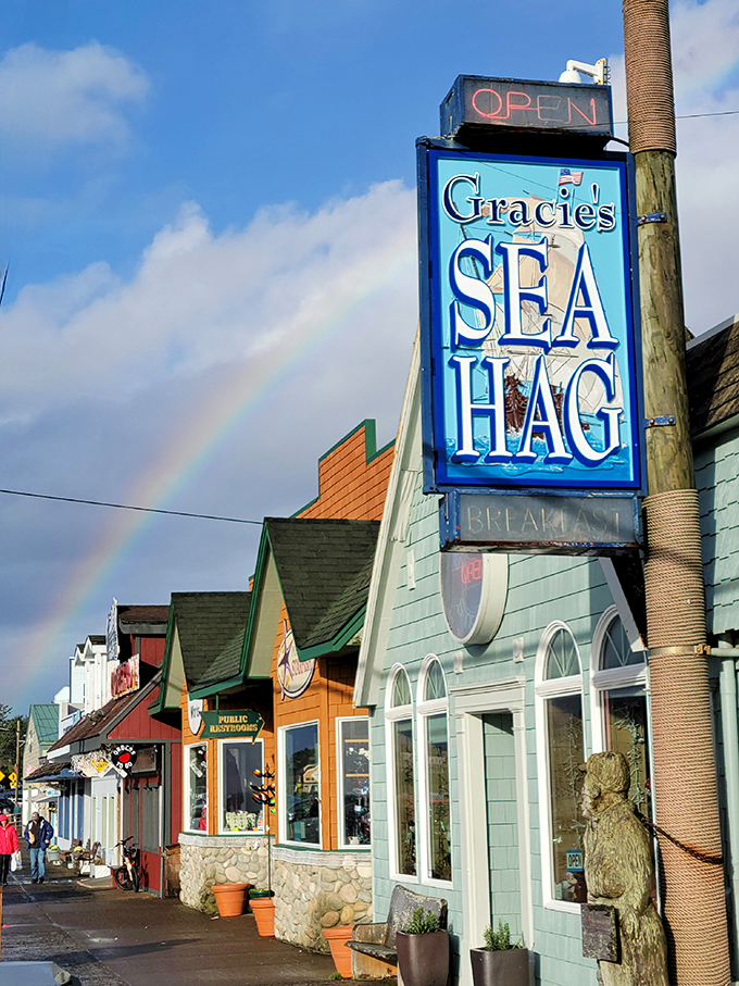 Gracie's Sea Hag sign promises character, and that rainbow overhead feels like nature's own five-star review.
