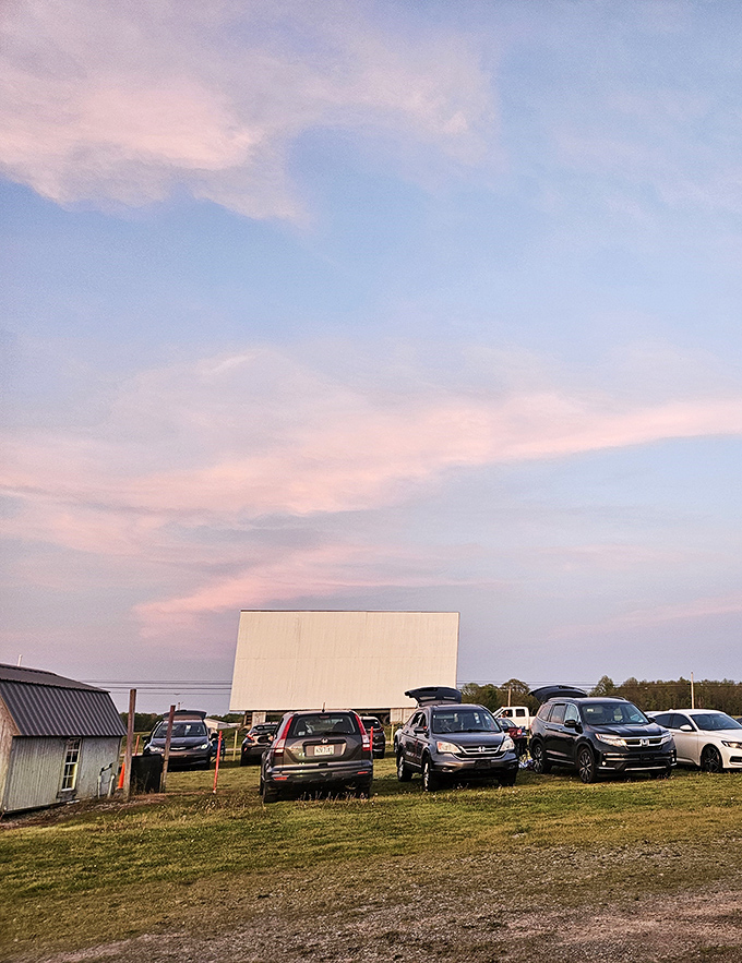 Hi-Road's screen stands ready against twilight skies. The original outdoor entertainment center, no WiFi password required!