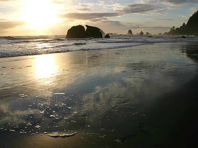 Hidden Beach lives up to its name with golden sands that seem to glow at sunset.