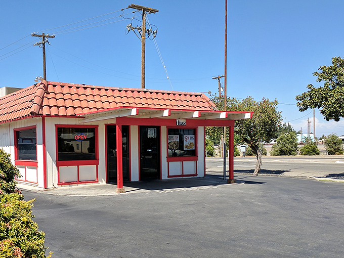 Simple red trim on white walls - sometimes the most understated places serve the most unforgettable meals.