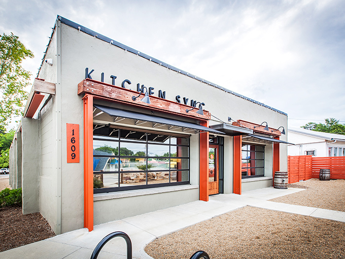 Kitchen Sync's clean modern lines and bright orange accents bring mom-and-pop dining into the 21st century without losing the soul.