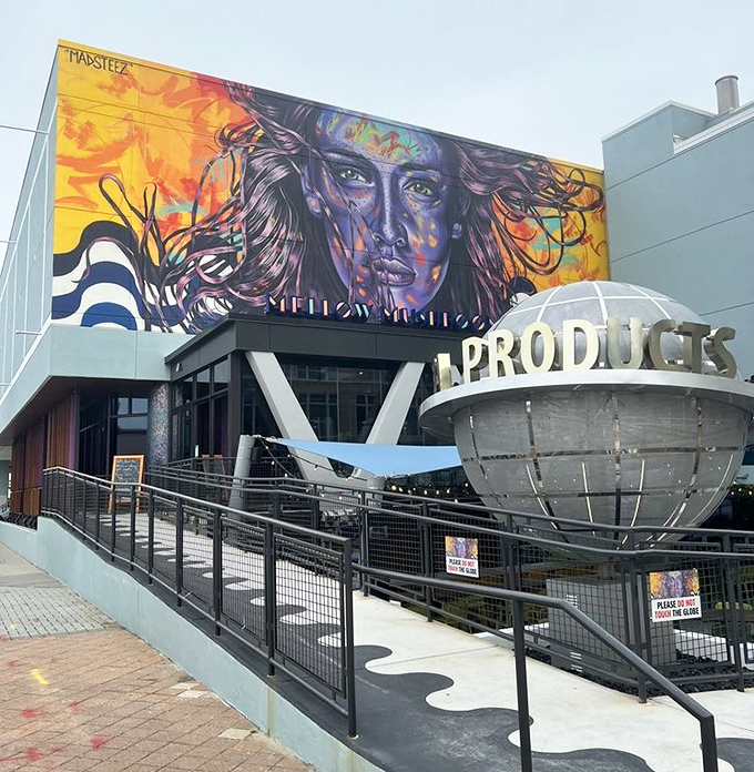 Mellow Mushroom's vibrant exterior art announces: "This isn't your average pizza experience!" A feast for eyes and stomach.