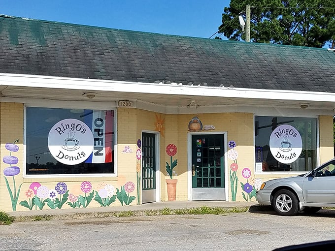 Ringo's sunny yellow exterior blooms with painted donut flowers &ndash; a whimsical preview of the creativity inside. Smithfield's most cheerful corner!