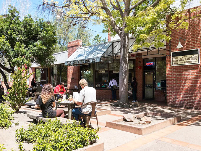 Old San Luis BBQ Company's brick exterior and shaded patio create the perfect setting for Central Coast BBQ traditions.