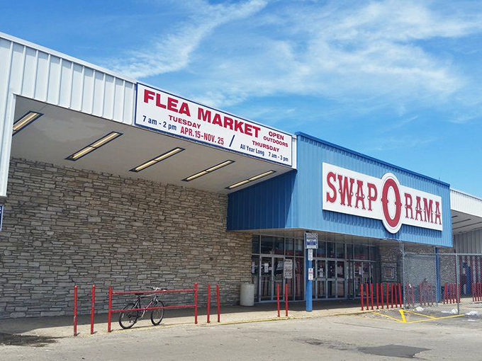 Blue skies match the building at this urban treasure trove. Where else can you find a bicycle parked next to decades of American retail history?