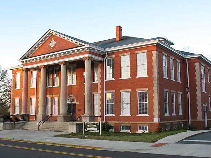 Red brick elegance that whispers of bygone eras. This courthouse has presided over more history than a Ken Burns series.