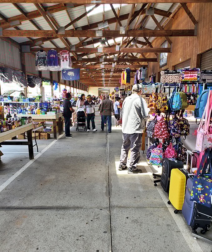 The South Carolina flag proudly hangs above Barnyard Flea Market Greer's treasure-filled aisles.