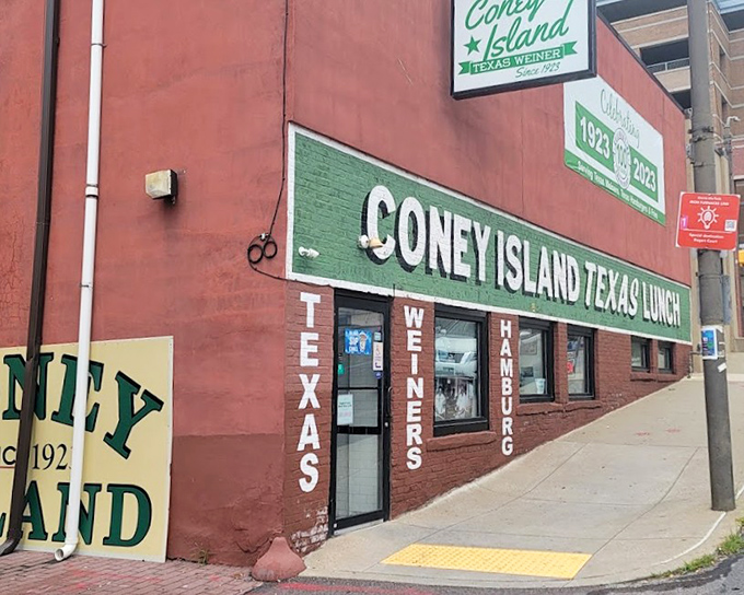 The vintage storefront of Coney Island Lunch has witnessed nearly a century of hot dog history – and shows no signs of slowing down.