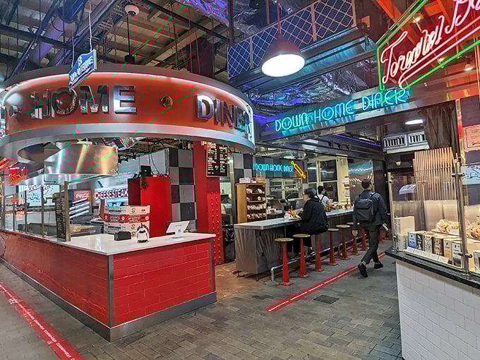 Neon lights and stainless steel create that perfect retro vibe at Down Home Diner in Reading Terminal Market.