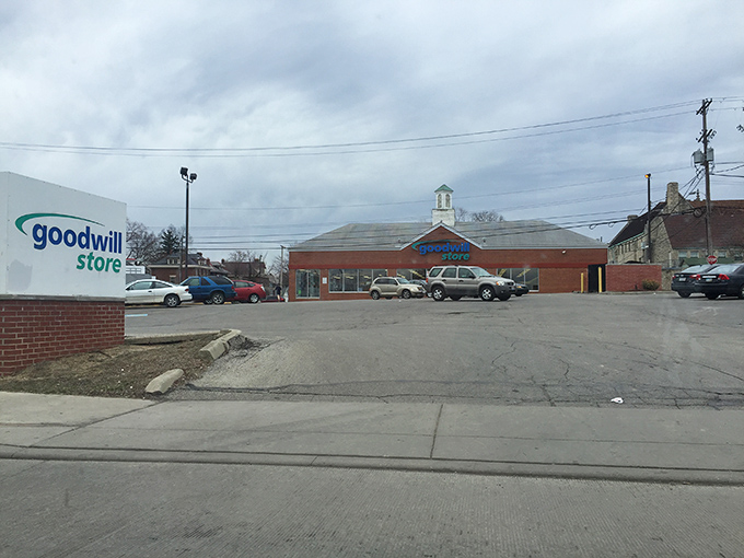 The parking lot view reveals Goodwill's substantial footprint&mdash;a kingdom of secondhand treasures awaiting exploration.