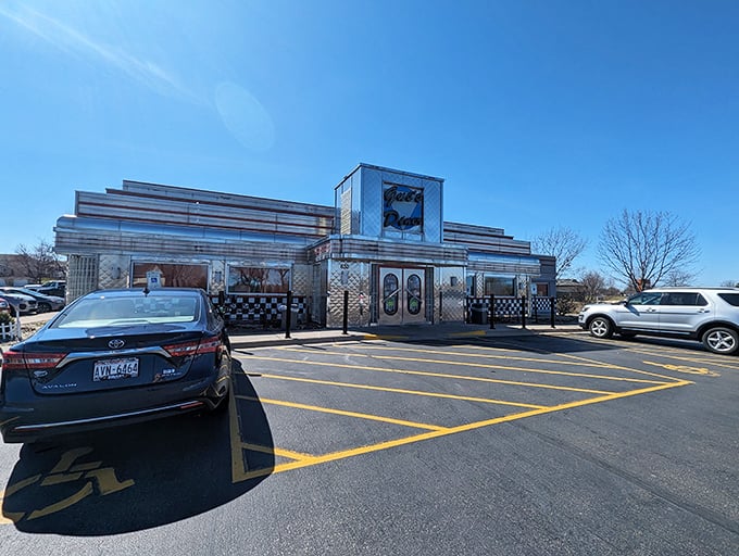 Gus's Diner: Where the silver exterior gleams like a beacon of breakfast hope on even the cloudiest Wisconsin morning.