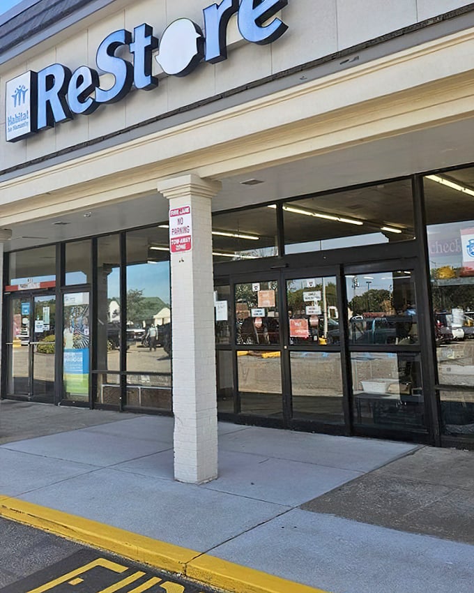 The ReStore's clean, welcoming entrance promises a treasure trove of home goods waiting just beyond those doors.