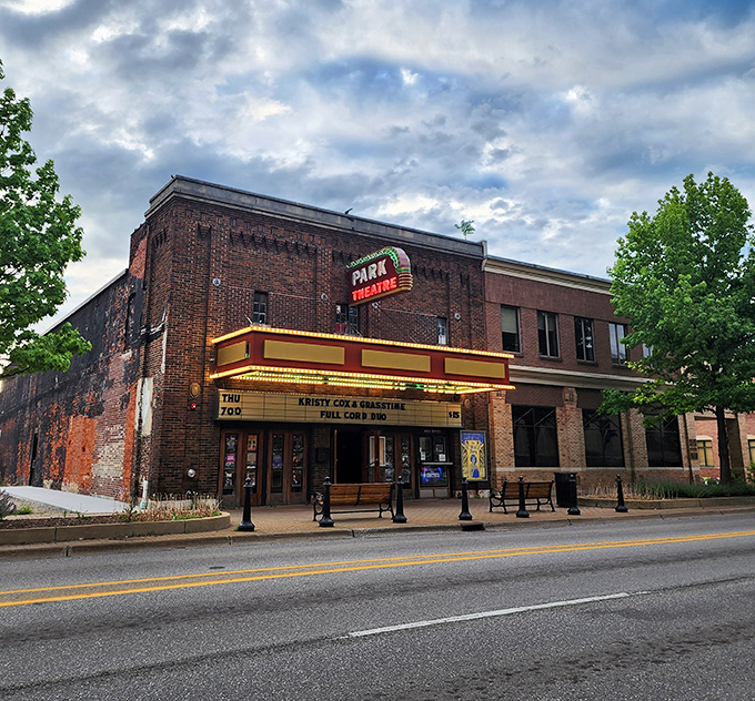Holland's historic Park Theatre marquee lights up the evening, offering affordable entertainment in this charming Dutch-influenced Michigan town.