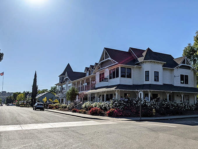 White Victorian charm meets California sunshine in this Los Olivos home, where wraparound porches invite afternoon relaxation.