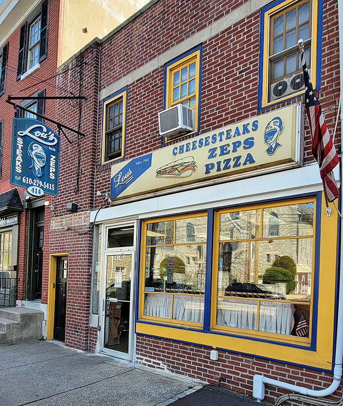 The blue and yellow facade of Lou's has witnessed decades of sandwich perfection&mdash;a colorful landmark in Norristown's culinary landscape.