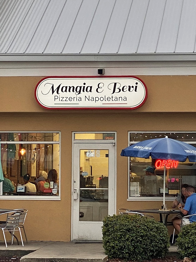 Mangia & Bevi: That cozy patio setup practically begs you to linger over one more slice as the Florida sun sets.