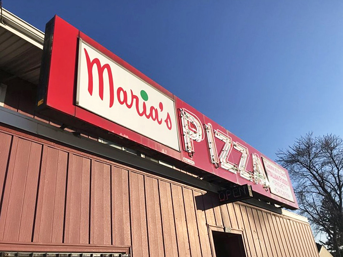 The sun sets, but Maria's sign glows eternal &ndash; promising pizza the way your grandparents enjoyed it, wonderfully unchanged.