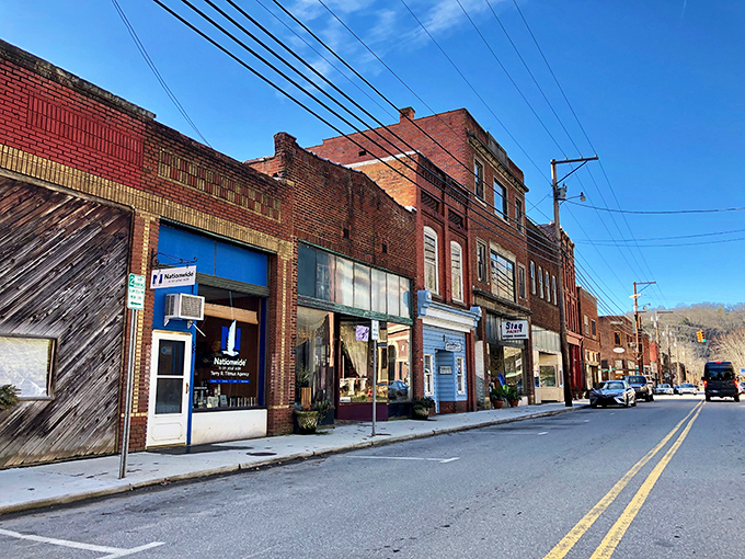 The small-town charm of Marshall's main street offers authentic mountain living. Where brick buildings tell stories and neighbors still wave hello.