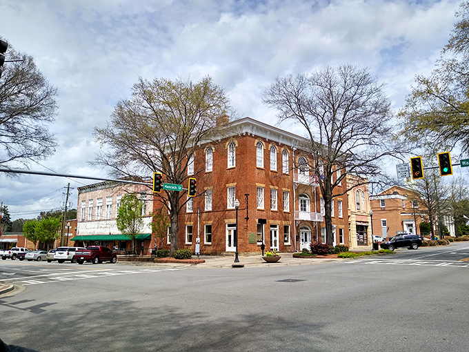 The red brick and white trim of Milledgeville's architecture creates a visual rhythm that's as pleasing as a well-played Southern waltz.