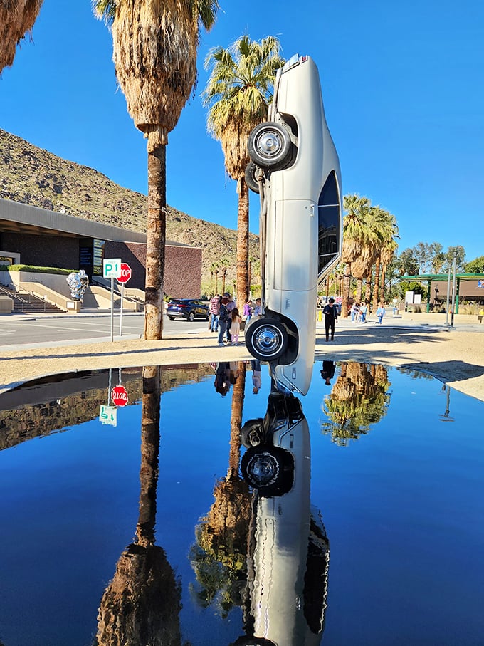 Only in Palm Springs would a vintage car standing on its nose seem like a perfectly reasonable piece of public art.