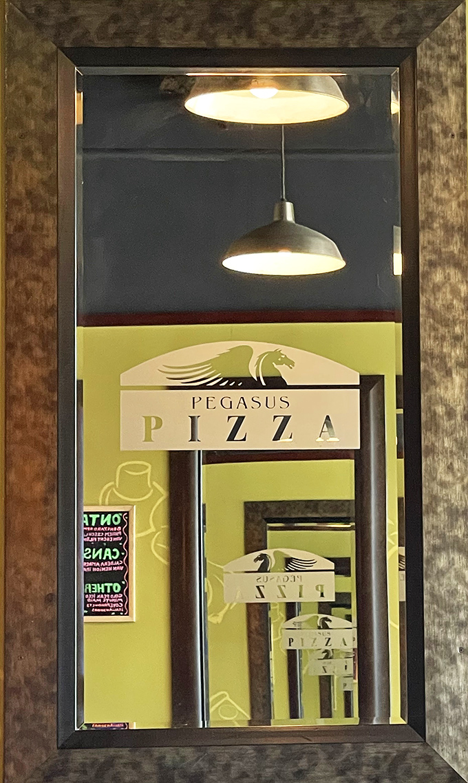 That cheerful yellow building with red trim has been a beacon of pizza hope for hungry Eugenians through good times and bad.