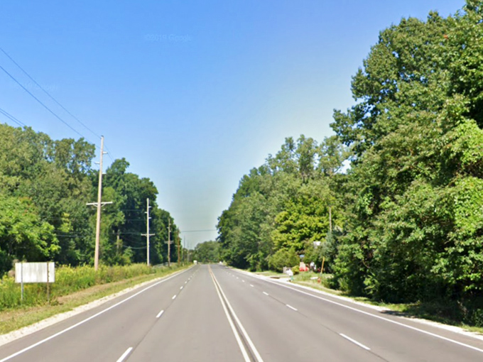 Tree-lined highways disappear into the distance, promising adventures around every single upcoming bend.
