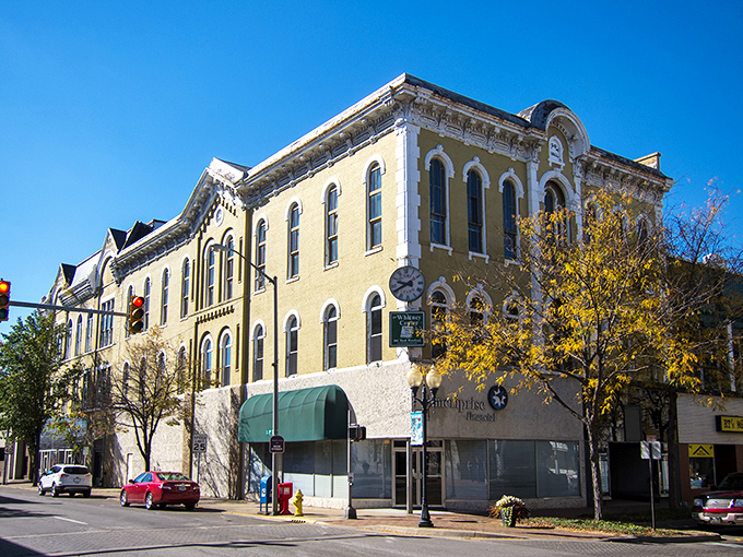 Victorian buildings watch over busy streets like dignified grandparents supervising a family reunion celebration.