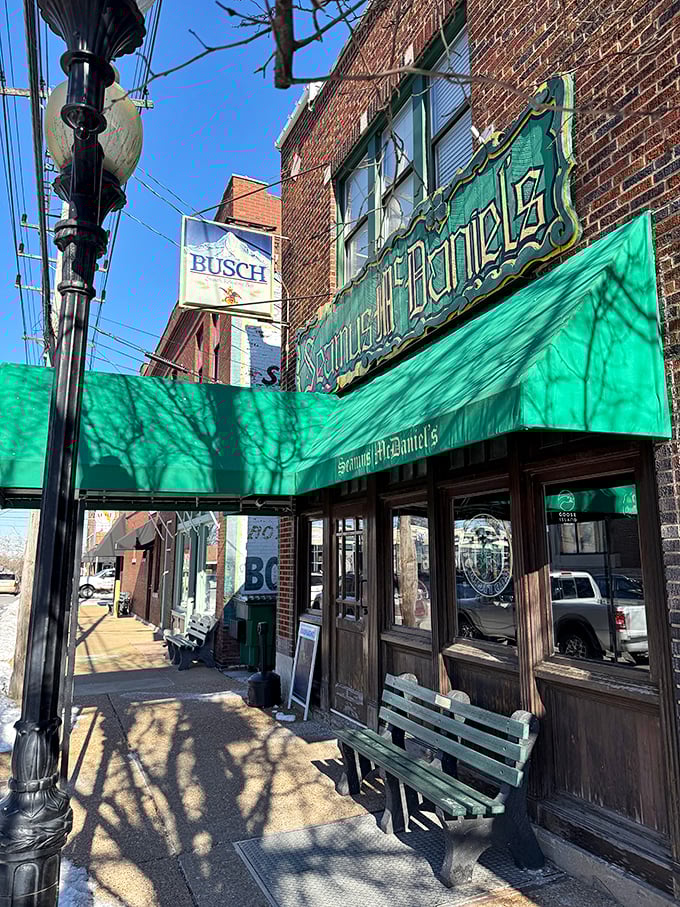 Green awnings and historic brick make Seamus McDaniel's instantly welcoming. The sidewalk bench invites you to rest a moment before tackling their legendary burger.