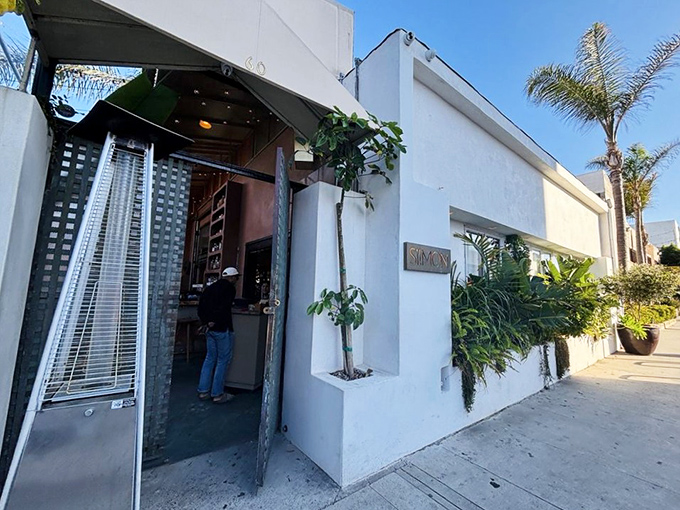 Those clean white walls and lush greenery create an oasis where exceptional seafood meets contemporary California cool. 