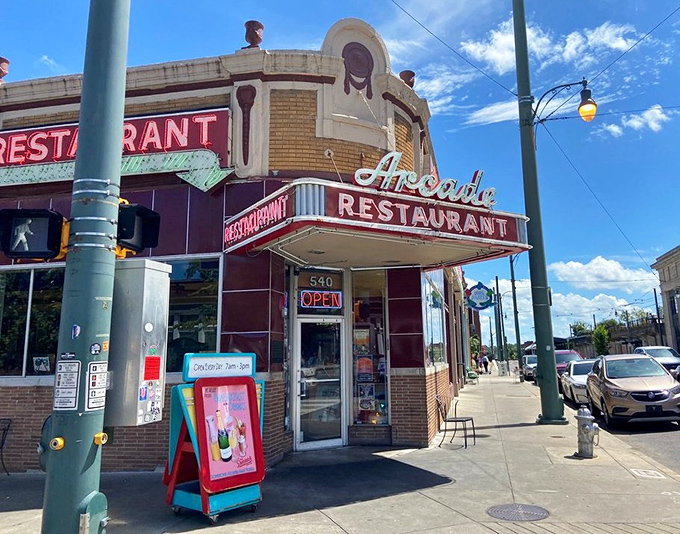 This corner institution wears its history proudly, serving generations of families seeking genuine diner magic.