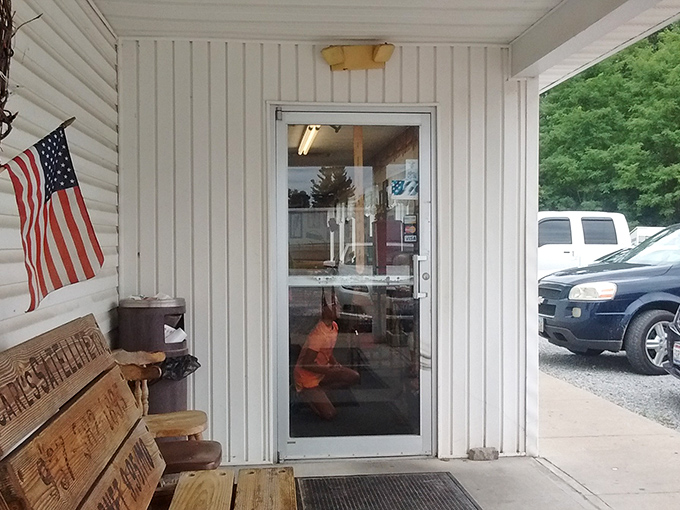 The American flag and wooden bench say it all&mdash;unpretentious, honest food served with small-town friendliness.