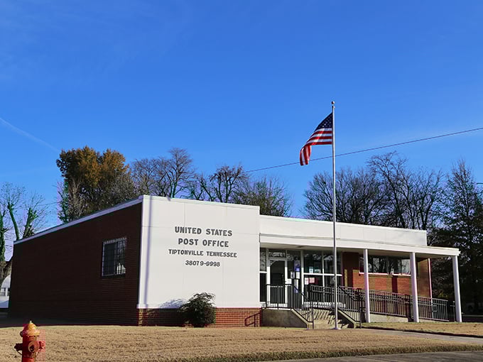 This brick municipal building anchors the community like a reliable friend, steady through all seasons of life.