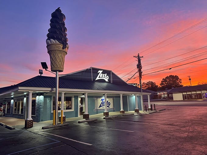 Zesto: Sunset transforms this blue building into a neon-lit hot dog paradise that belongs on a vintage postcard.