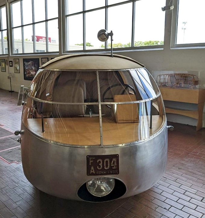 The 1933 Dymaxion replica looks like a chrome submarine that took a wrong turn. Buckminster Fuller's vision of the future remains delightfully bizarre.