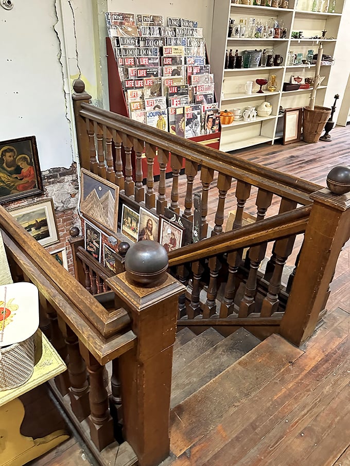 The staircase isn't just functional&mdash;it's architectural poetry connecting different worlds of collectibles across multiple floors of discovery.