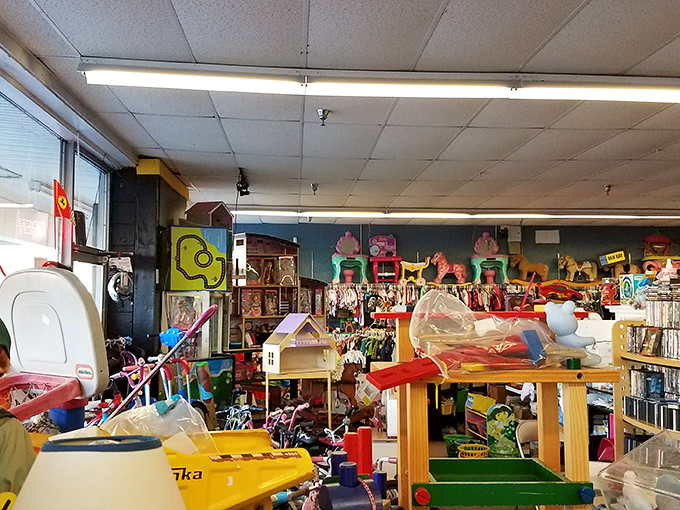 Dollhouses and playthings create a miniature neighborhood of imagination, proving one child's outgrown toy becomes another's new obsession.