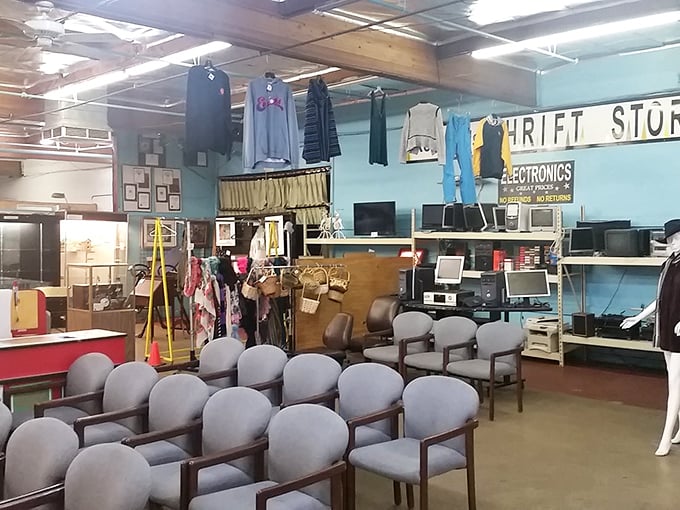 A congregation of office chairs faces the electronics section, as if waiting for a PowerPoint presentation on "How to Furnish Your Startup on a Shoestring."