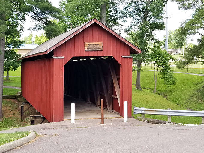 Armstrong Covered Bridge stands as a crimson sentinel to simpler times, when "taking the scenic route" wasn't just a euphemism for being hopelessly lost.