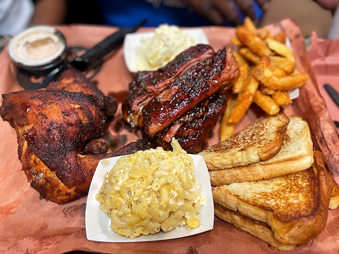 Ribs, mac and cheese, and Texas toast – a combination so perfect it should have its own national holiday. The bark on those ribs means business.