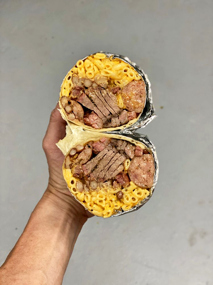 Whoever decided to wrap brisket, beans, and mac and cheese in a tortilla deserves a Nobel Prize in Culinary Common Sense.
